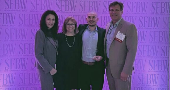 Adam Talbot Honored at Up and Comer Awards Cresa